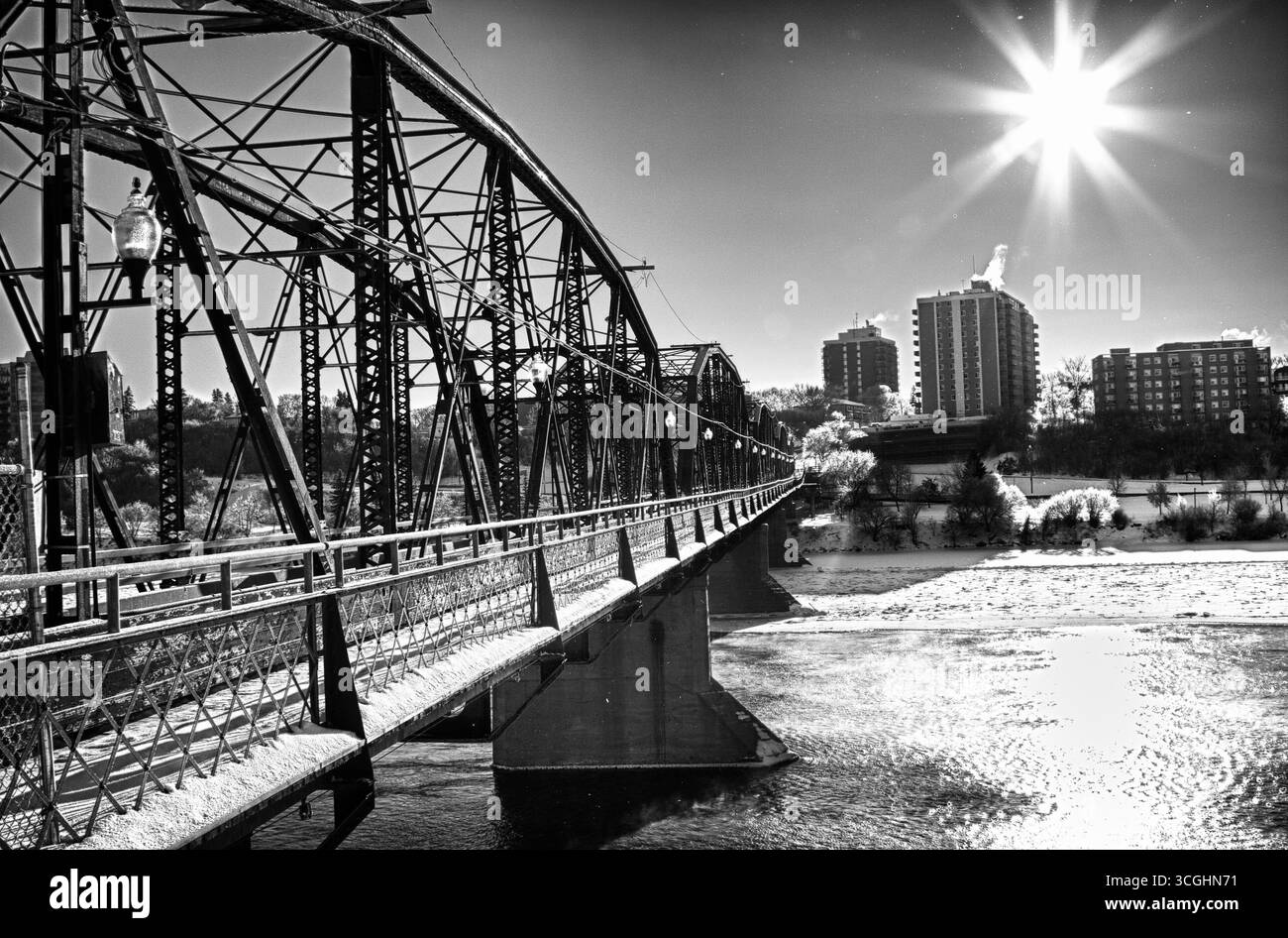 A modern steel structure, the rebuilt Traffic Bridge spans the South ...