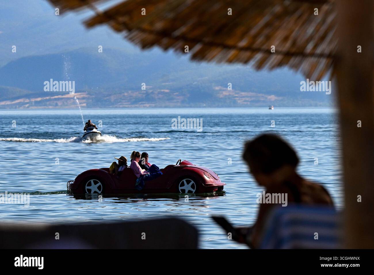 (250828) -- STRUGA (NORTH MACEDONIA), Aug. 28, 2025 (Xinhua) -- People ...