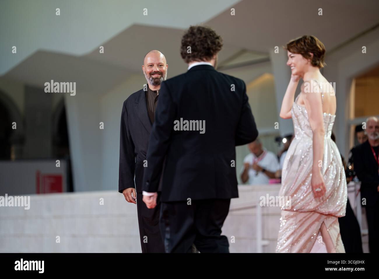 Yorgos Lanthimos, Emma Stone, and Jesse Plemons attend the ''Bugonia ...