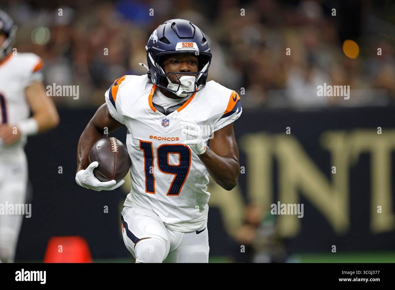 Denver Broncos wide receiver Marvin Mims Jr. (19) runs the ball during ...