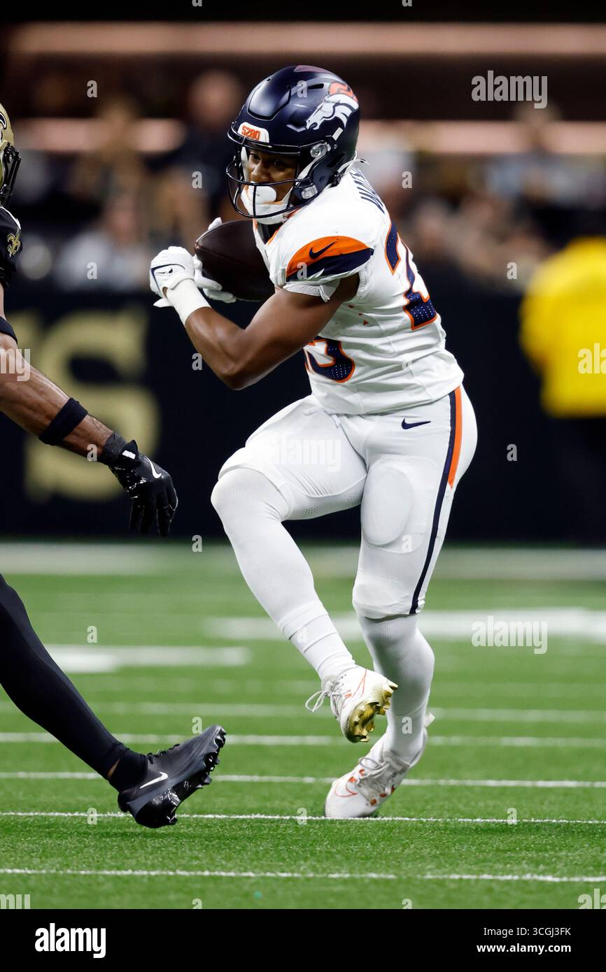 Denver Broncos running back Blake Watson (25) runs the ball during an ...