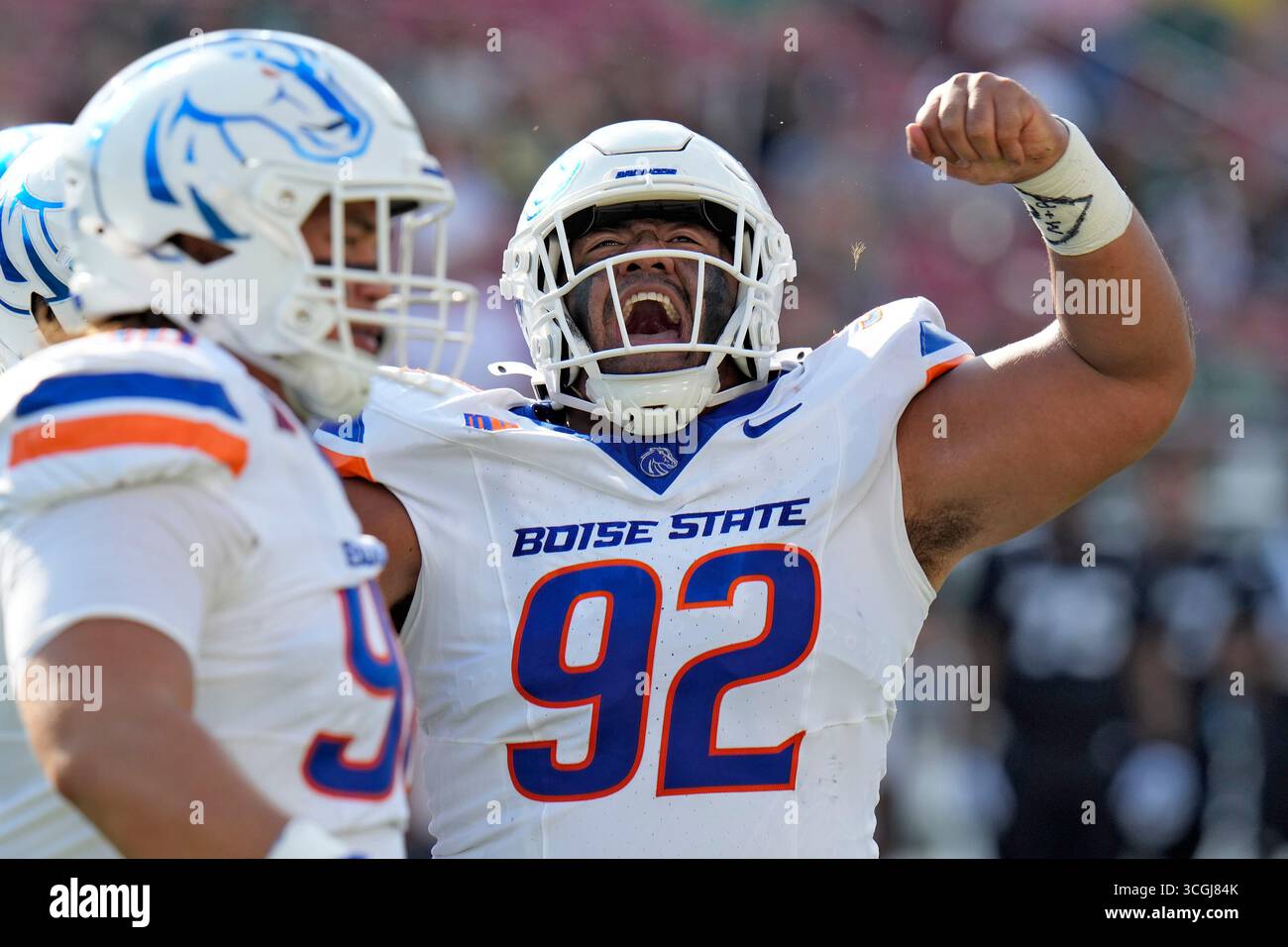 Boise State defensive lineman David Latu (92) celebrates after sacking ...