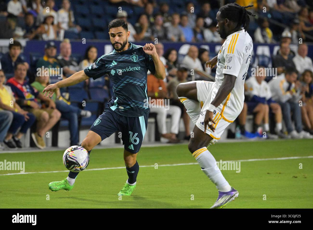 Seattle Sounders midfielder Alex Roldan (16) moves the ball past ...