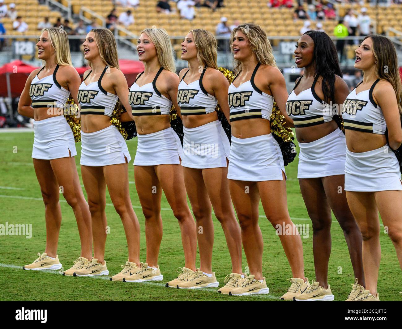 August 28, 2025: Members of the UCF Knights cheer Team performs before ...