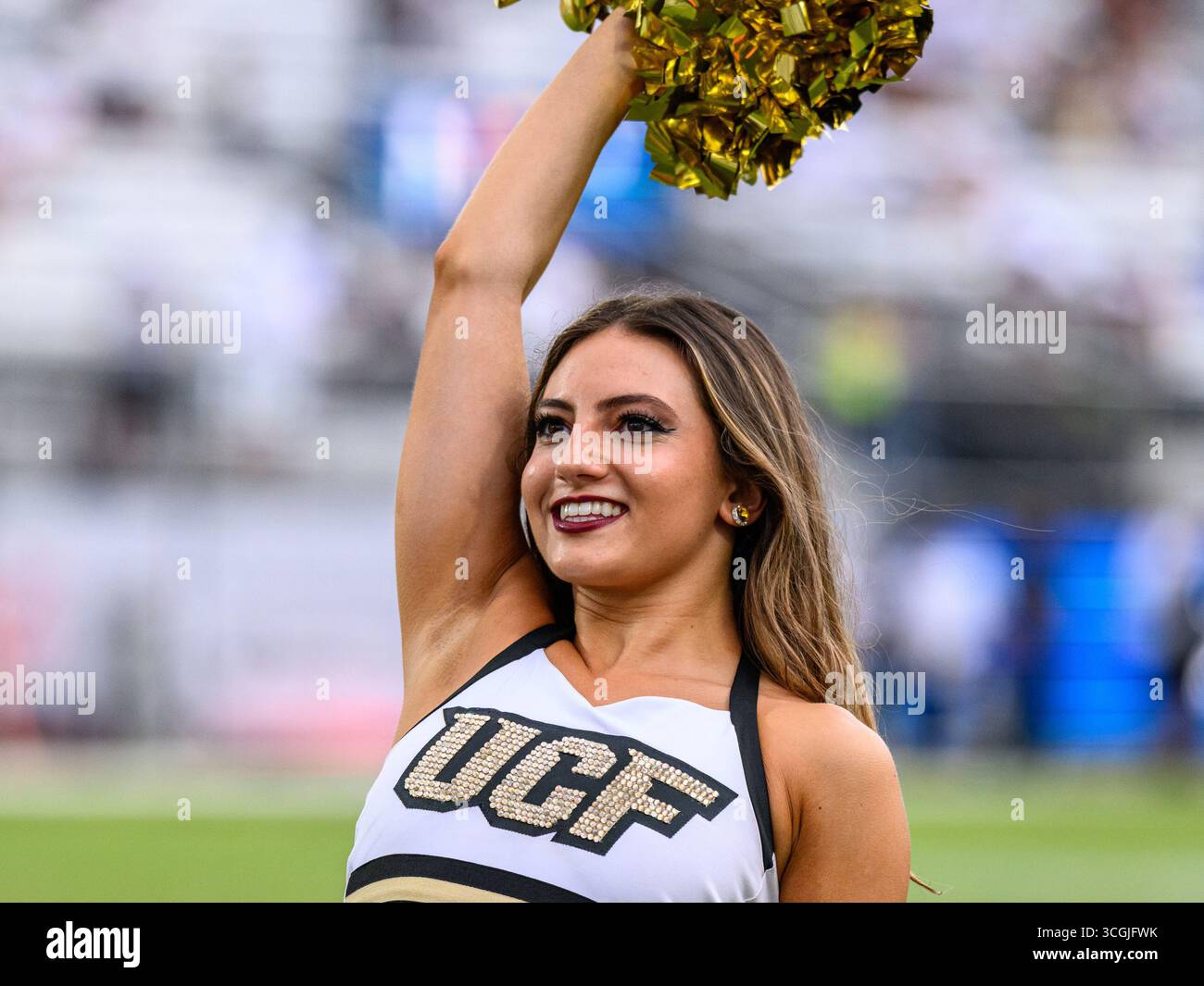 August 28, 2025: Member of the UCF Knights cheer Team performs before ...