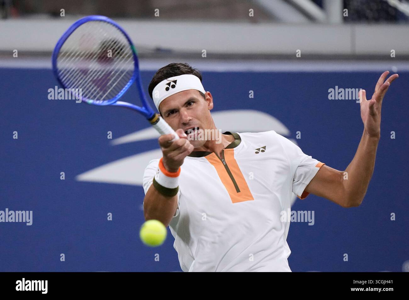 Daniel Altmaier, of Germany, returns a shot Stefanos Tsitsipas, of ...