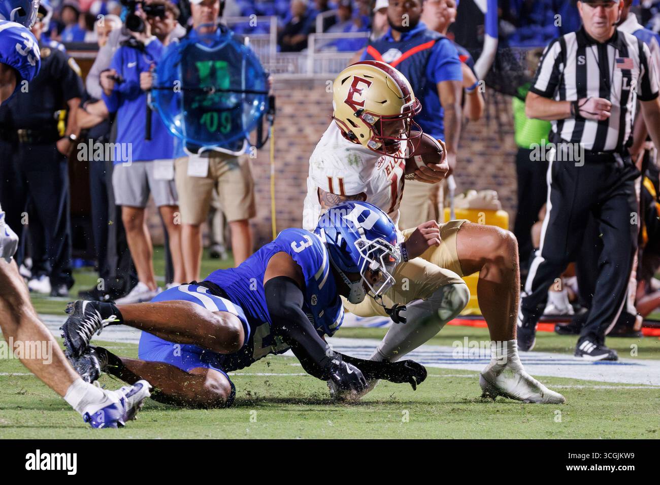 Elon's Landen Clark (11) is stopped short of the goal line by Duke's ...
