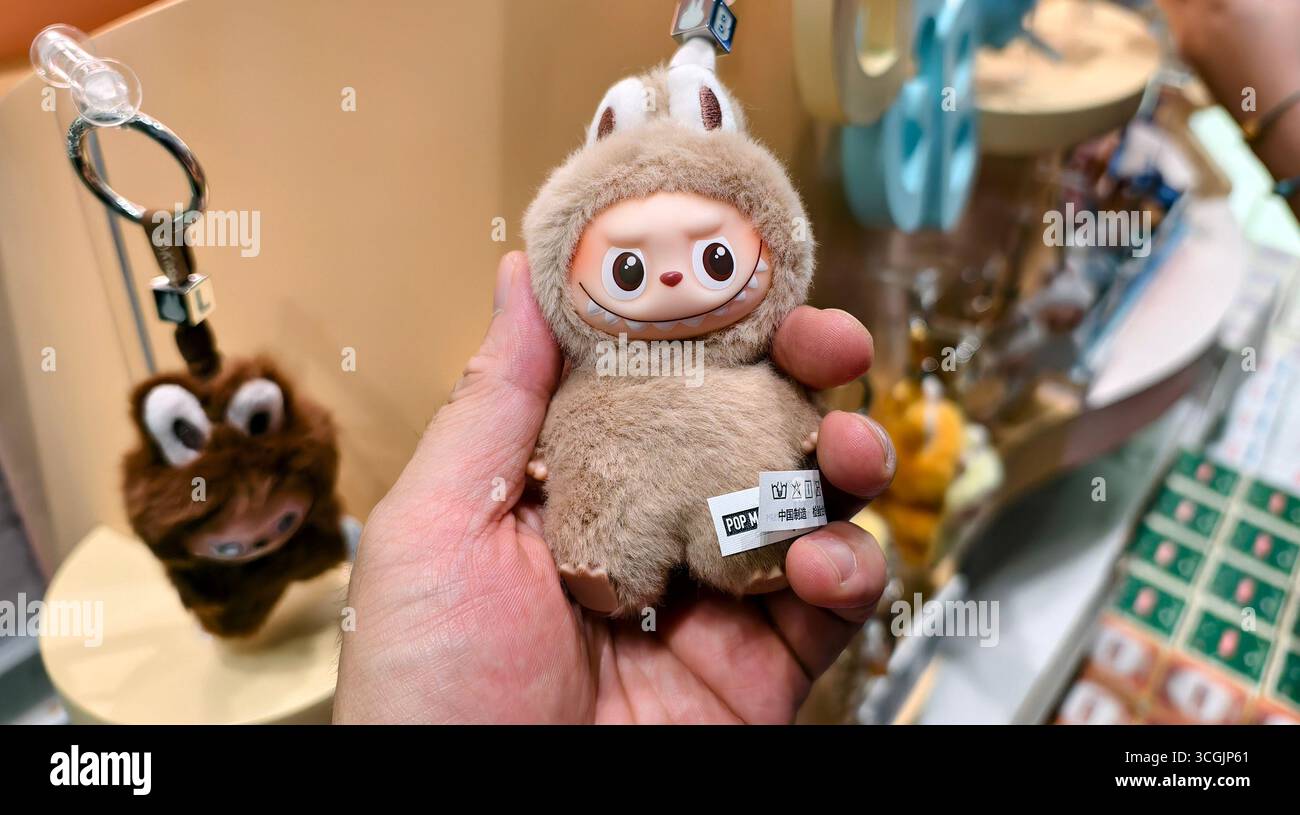 SHANGHAI, CHINA - AUGUST 28, 2025 - Customers buy mini version Labubu ...