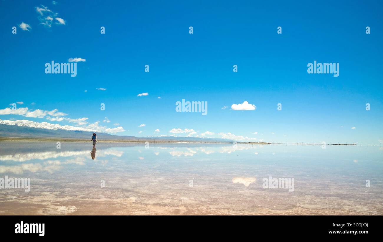 Lone person walks across hi-res stock photography and images - Alamy