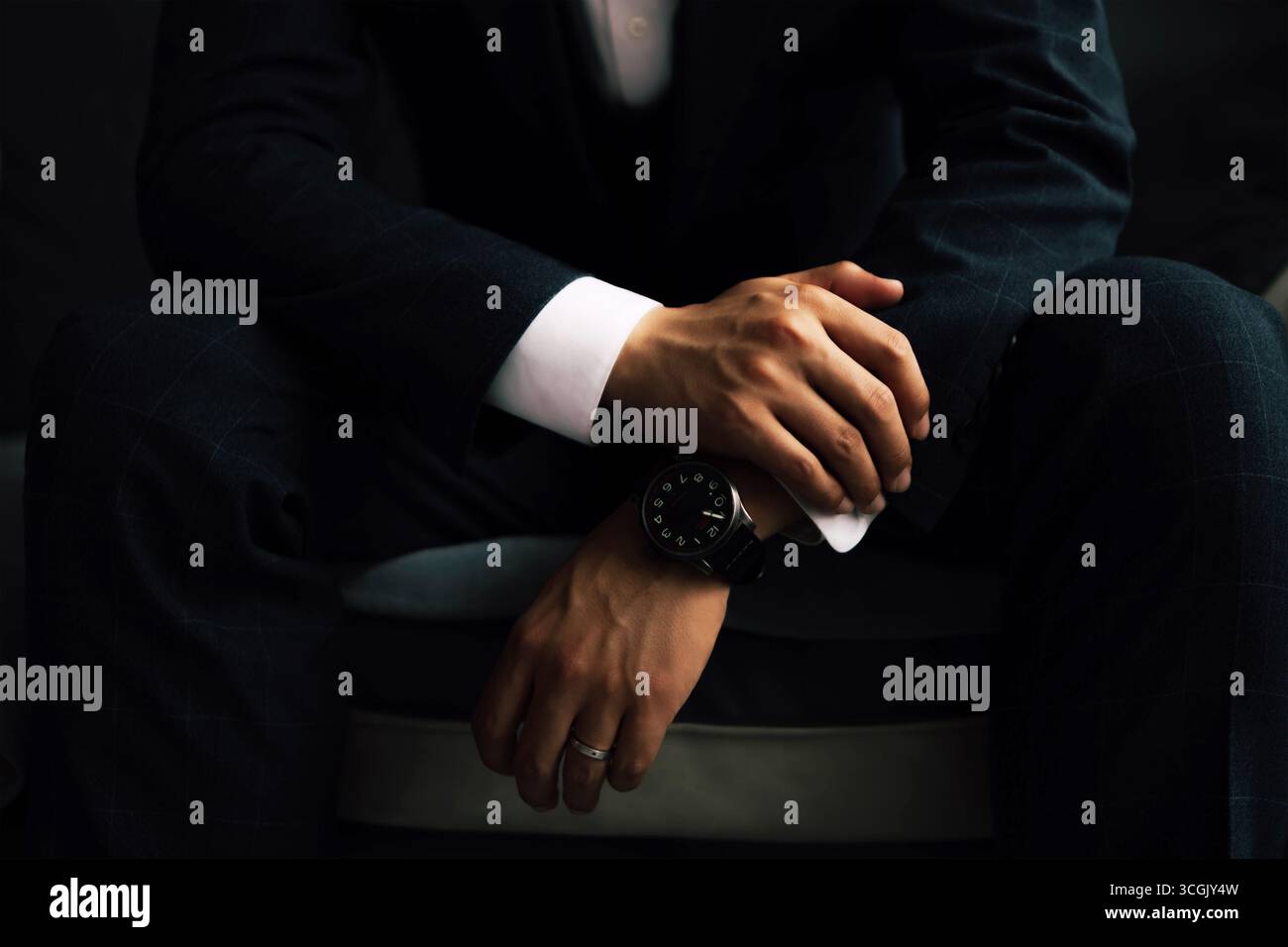 Man in Dark Suit with Black Watch and Wedding Band, Hands Detail Stock ...