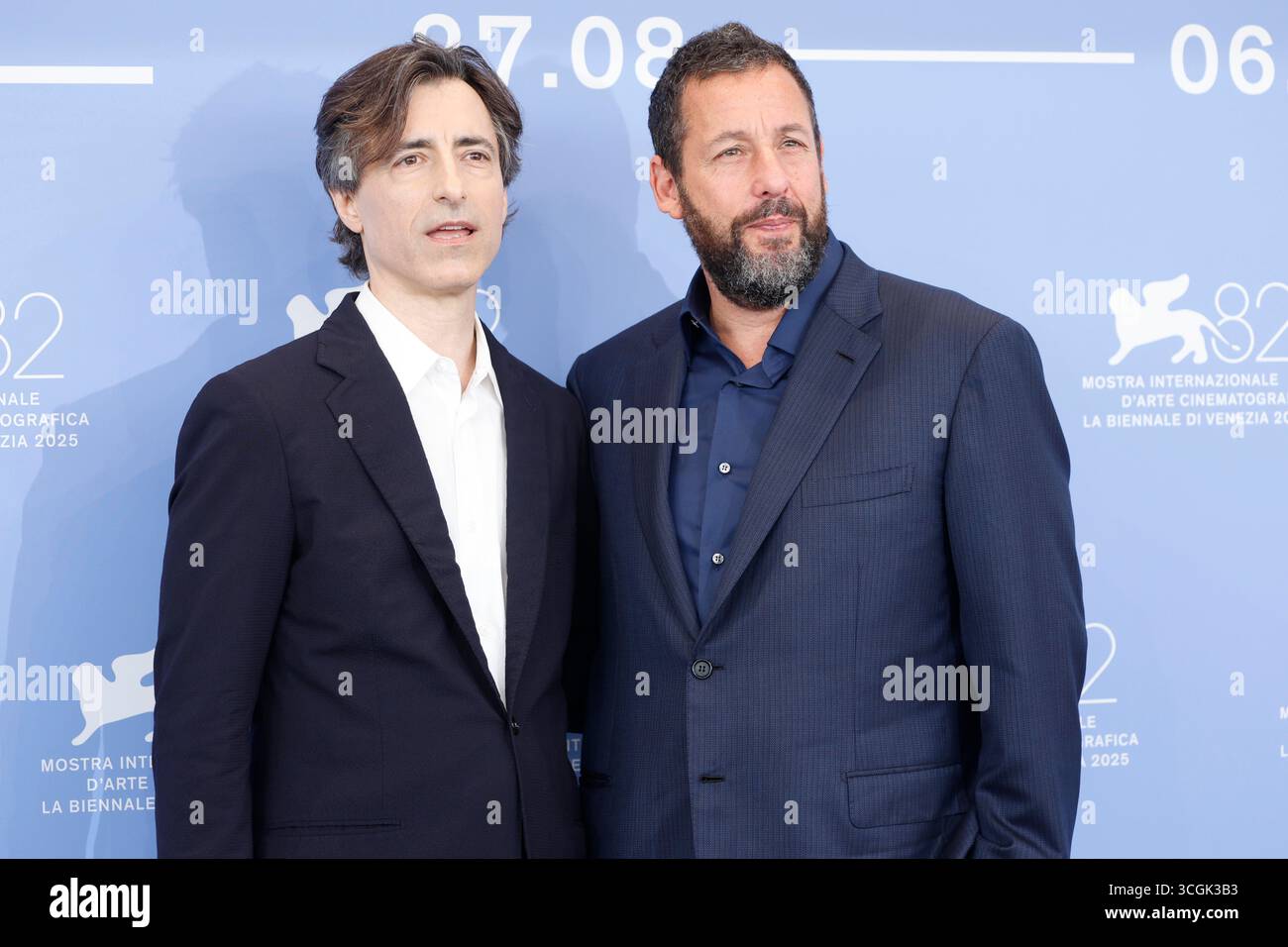 Noah Baumbach and Adam Sandler pose at the photocall of 'Jay Kelly ...
