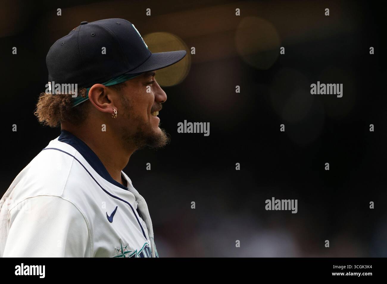 Seattle Mariners first baseman Josh Naylor smiles after a play during a ...