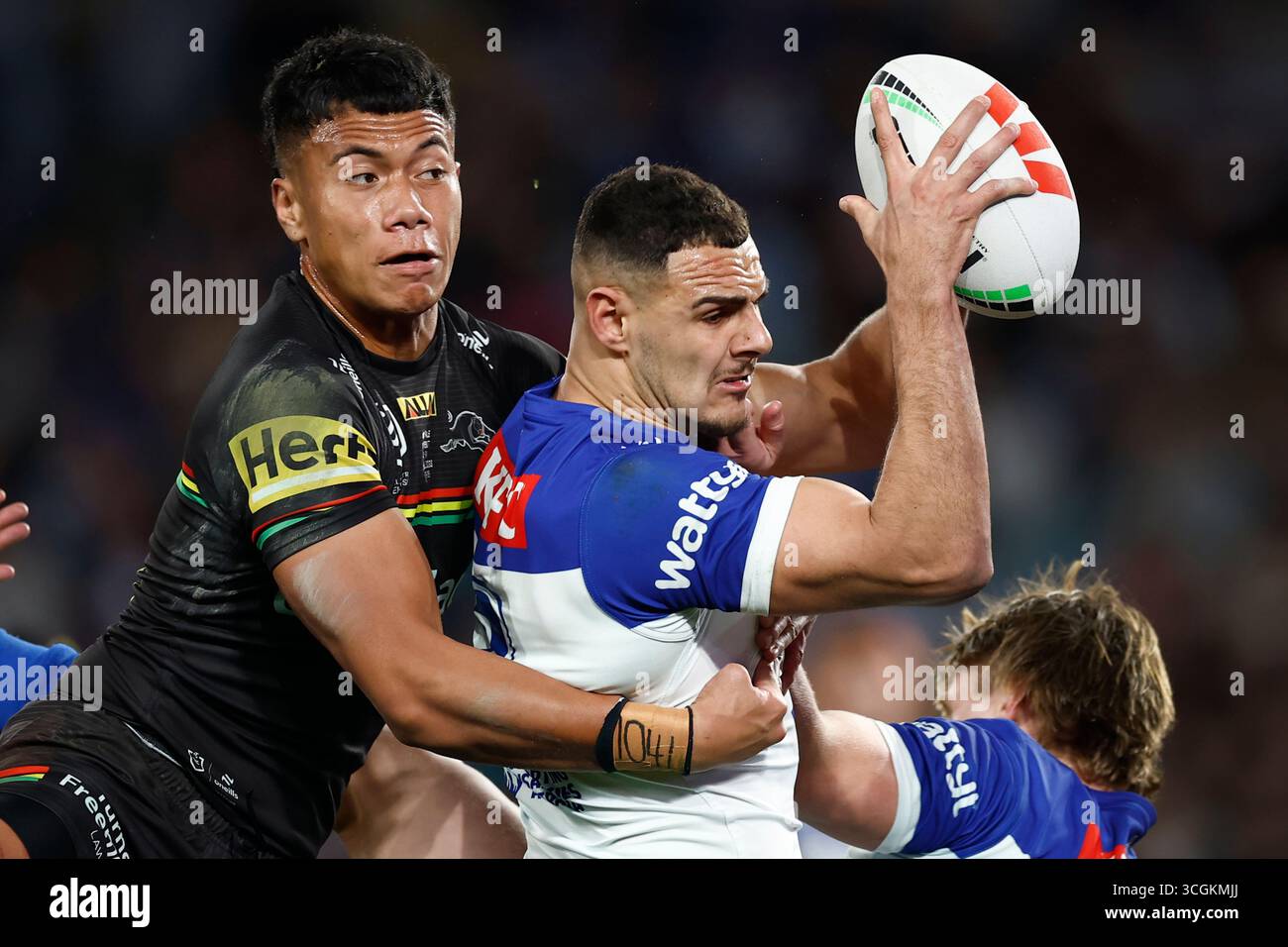 Jacob Kiraz of the Bulldogs is tackled during the Round 26 NRL match ...