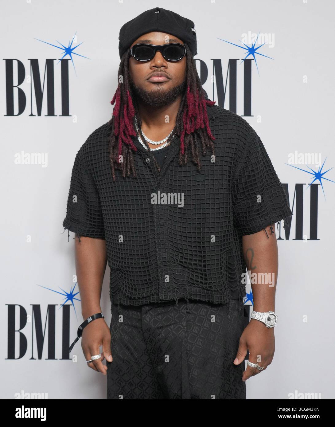 Leon Thomas III arrives at the 2025 BMI R&B/Hip-Hop Awards held at the ...