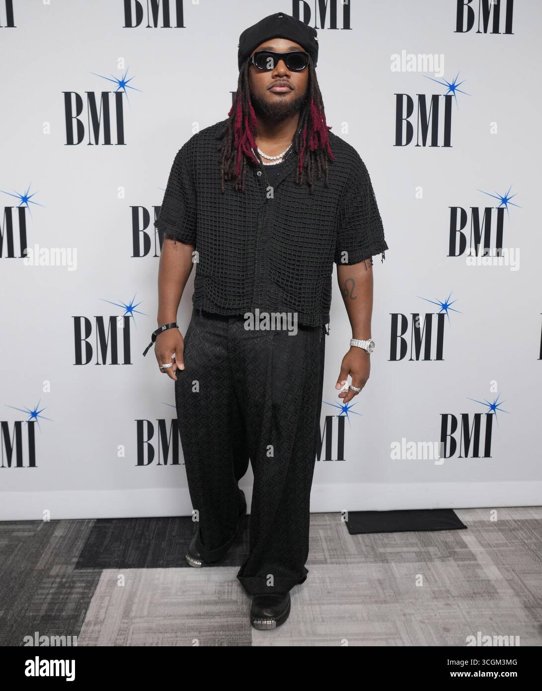 Leon Thomas III arrives at the 2025 BMI R&B/Hip-Hop Awards held at the ...