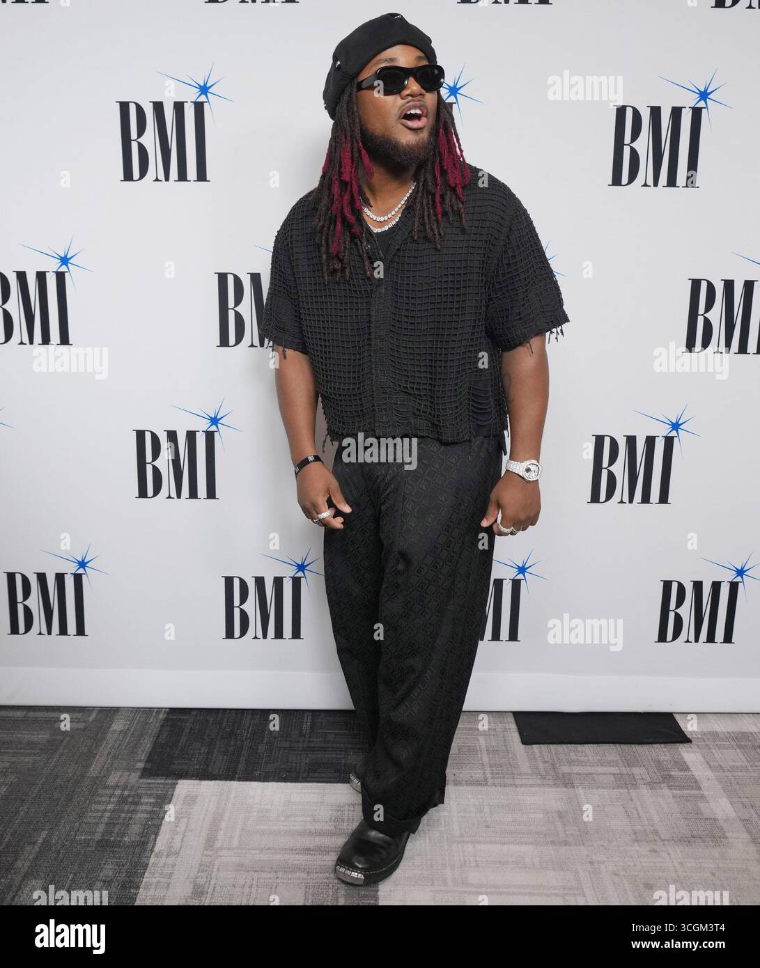 Leon Thomas III arrives at the 2025 BMI R&B/Hip-Hop Awards held at the ...