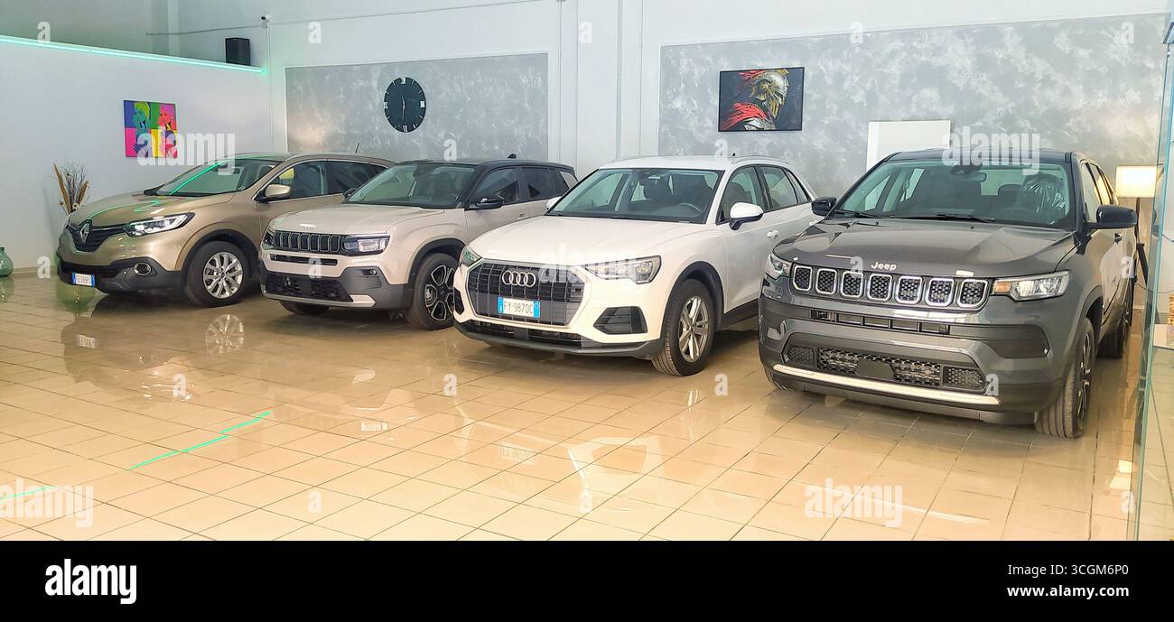 Some used cars of various brands seen inside a show dedicated to the ...