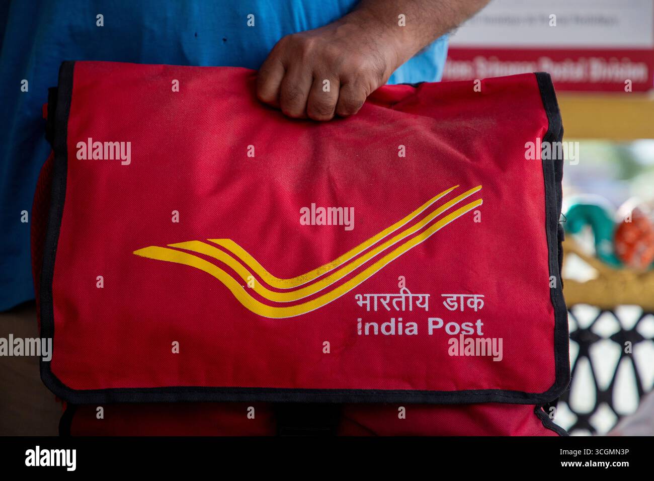 Srinagar, Jammu And Kashmir, India. 27th Aug, 2025. A Postman seen ...