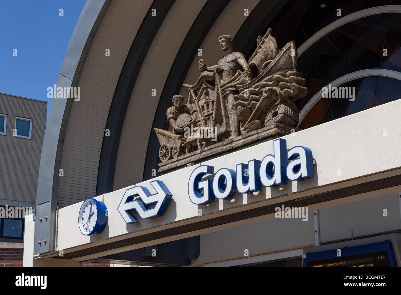 A close-up of the "Gouda" train station sign and the impressive ...