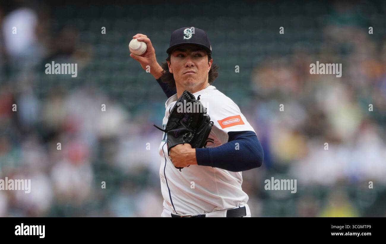 Seattle Mariners starting pitcher Bryan Woo throws against the San ...