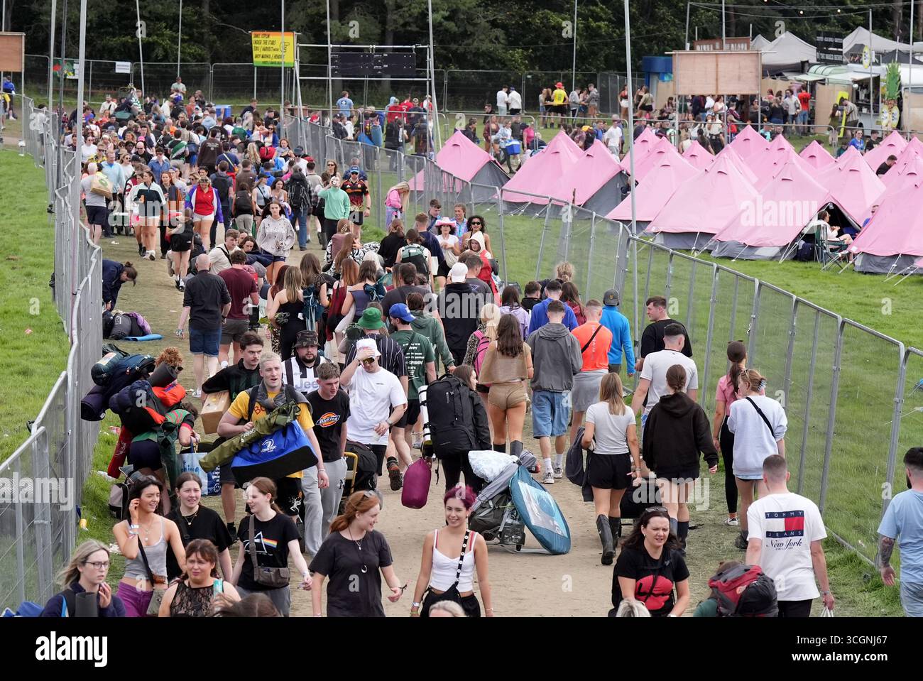 Festivalgoers arrive on the first day of the Electric Picnic festival ...