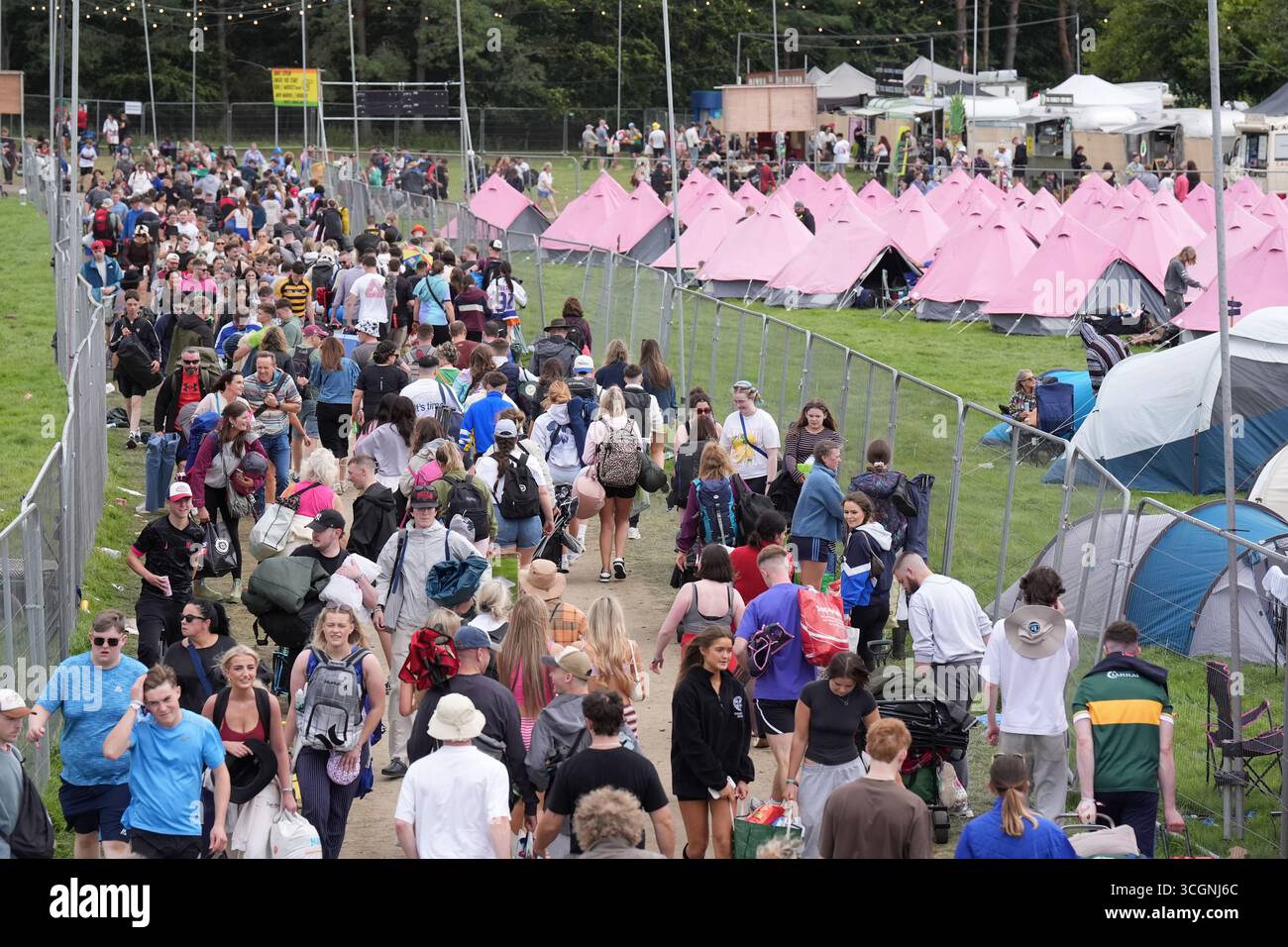 Festivalgoers arrive on the first day of the Electric Picnic festival ...