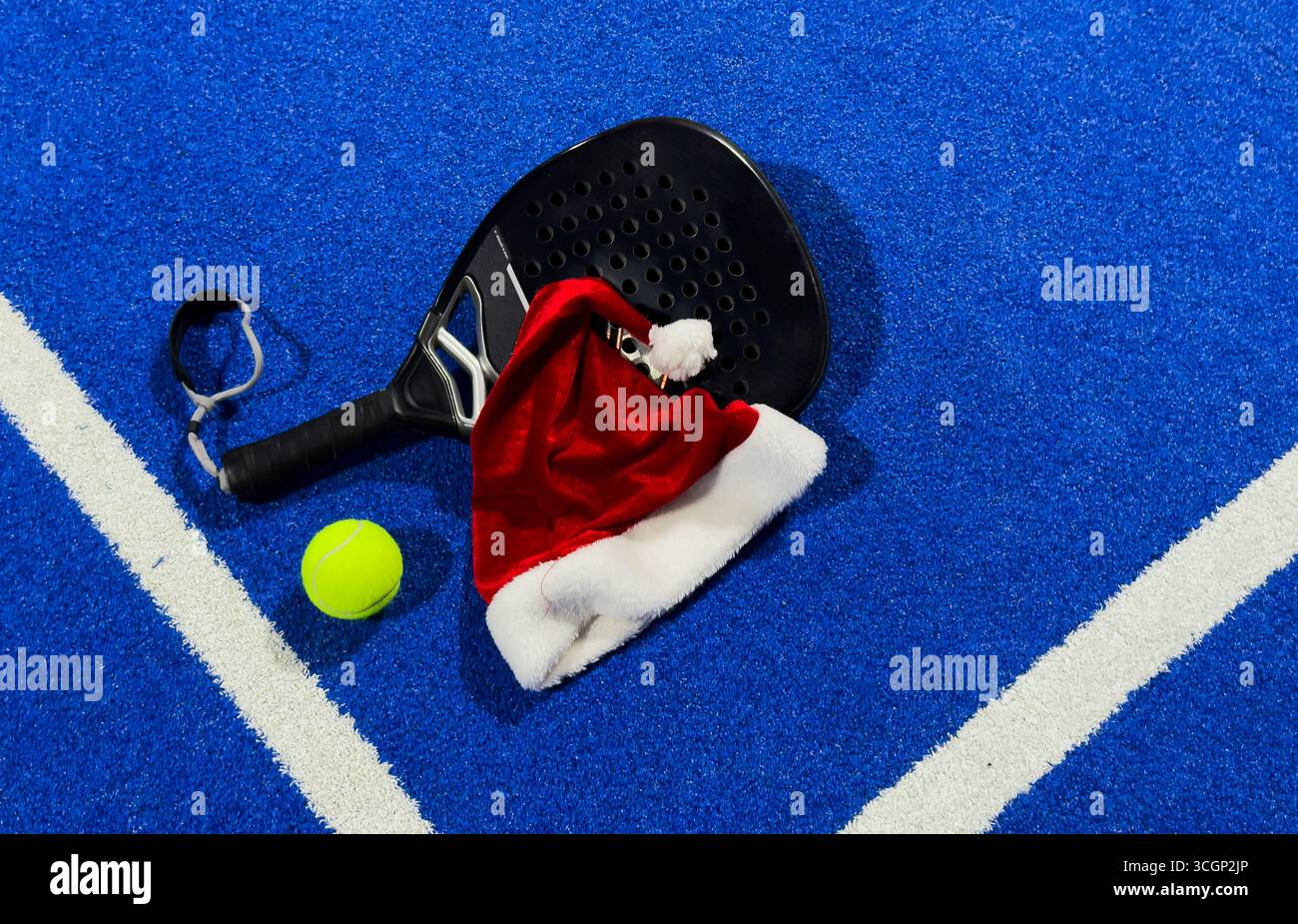 padel racket and santa hat Stock Photo - Alamy