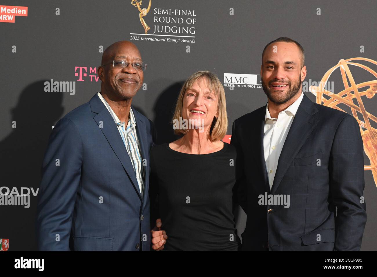 Ex Sportler Edwin Moses mit Sohn Julian Moses und dessen Mutter Anne ...