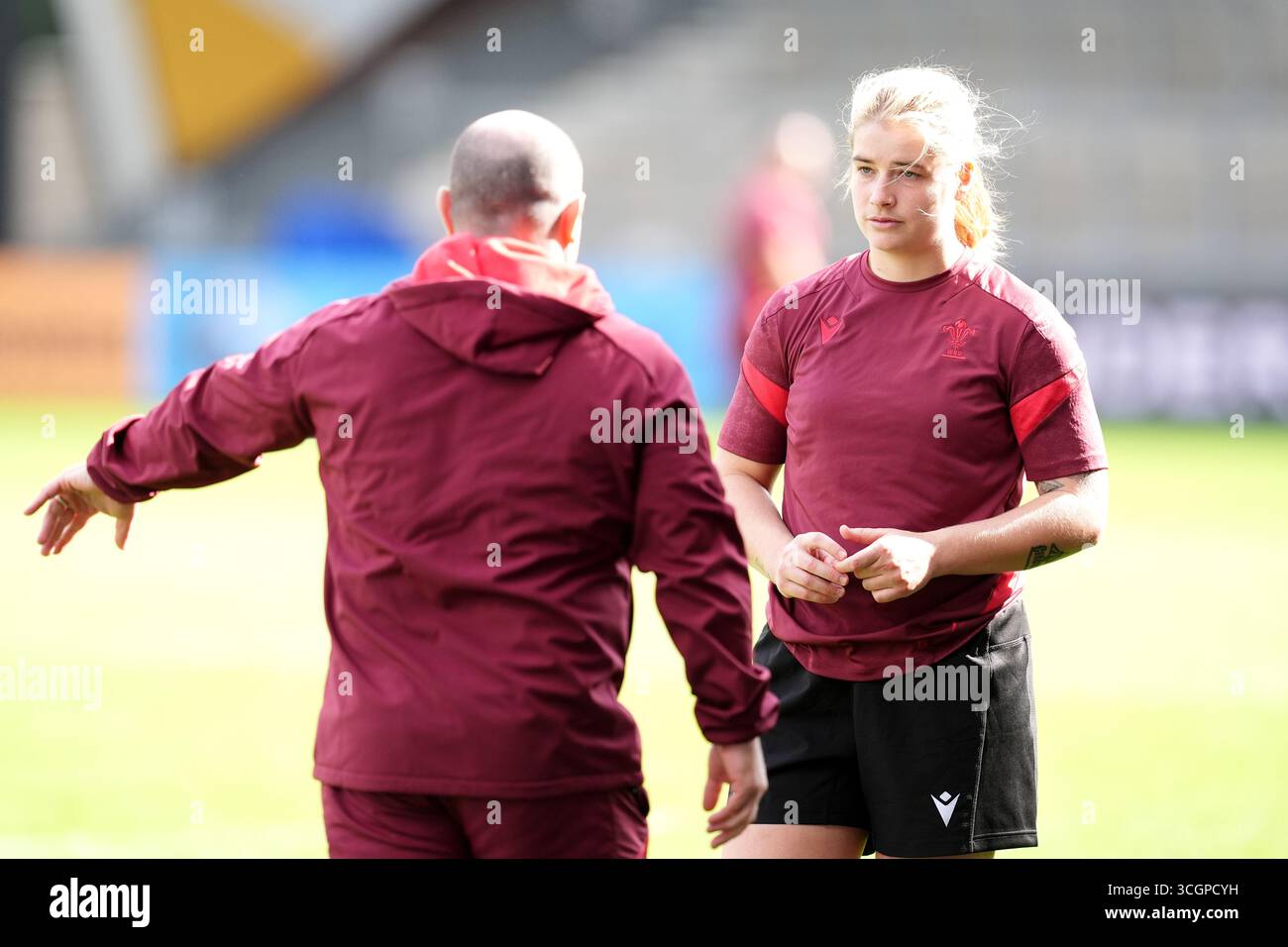 Wales Women captain Bethan Lewis (right) speaks with head coach Sean ...