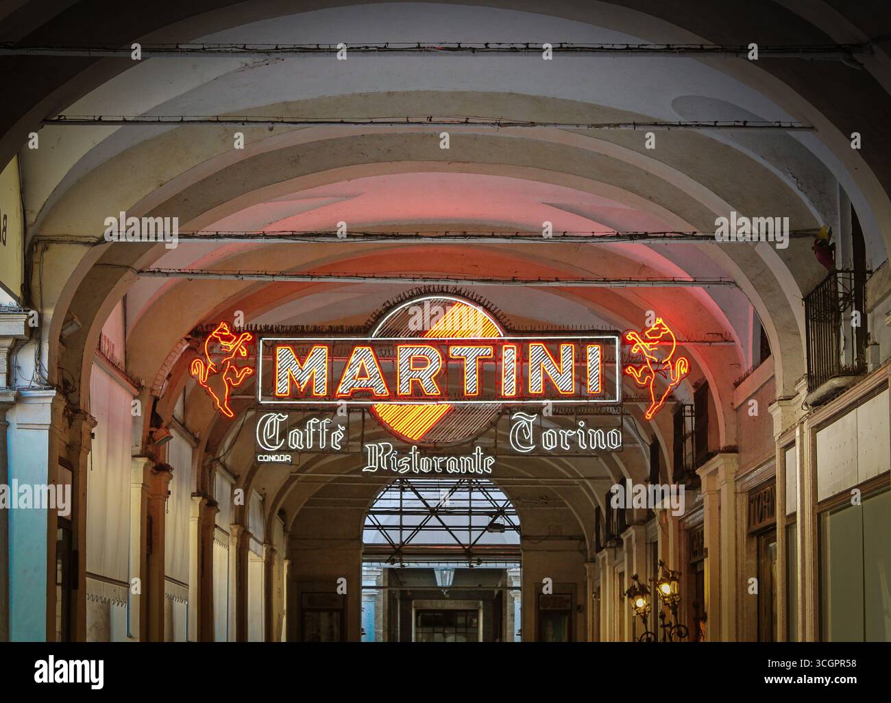 In the heart of Turin: the neon Martini of Café Torino Stock Photo - Alamy