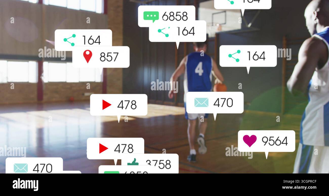 Dribbling man in blue jersey numbered 4 holding basketball at gym, with ...