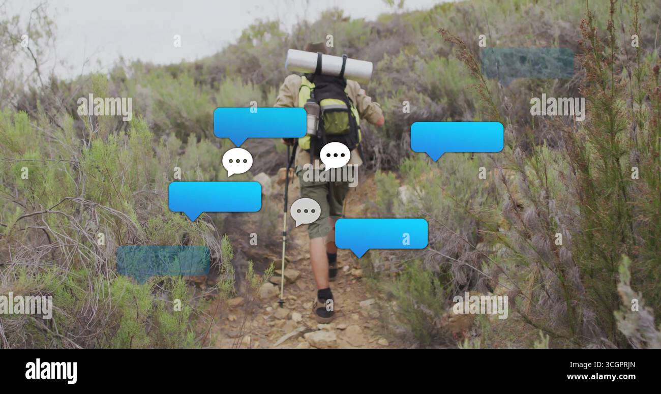 Climbing hiker wearing cargo shorts using pole on hillside trail, with ...