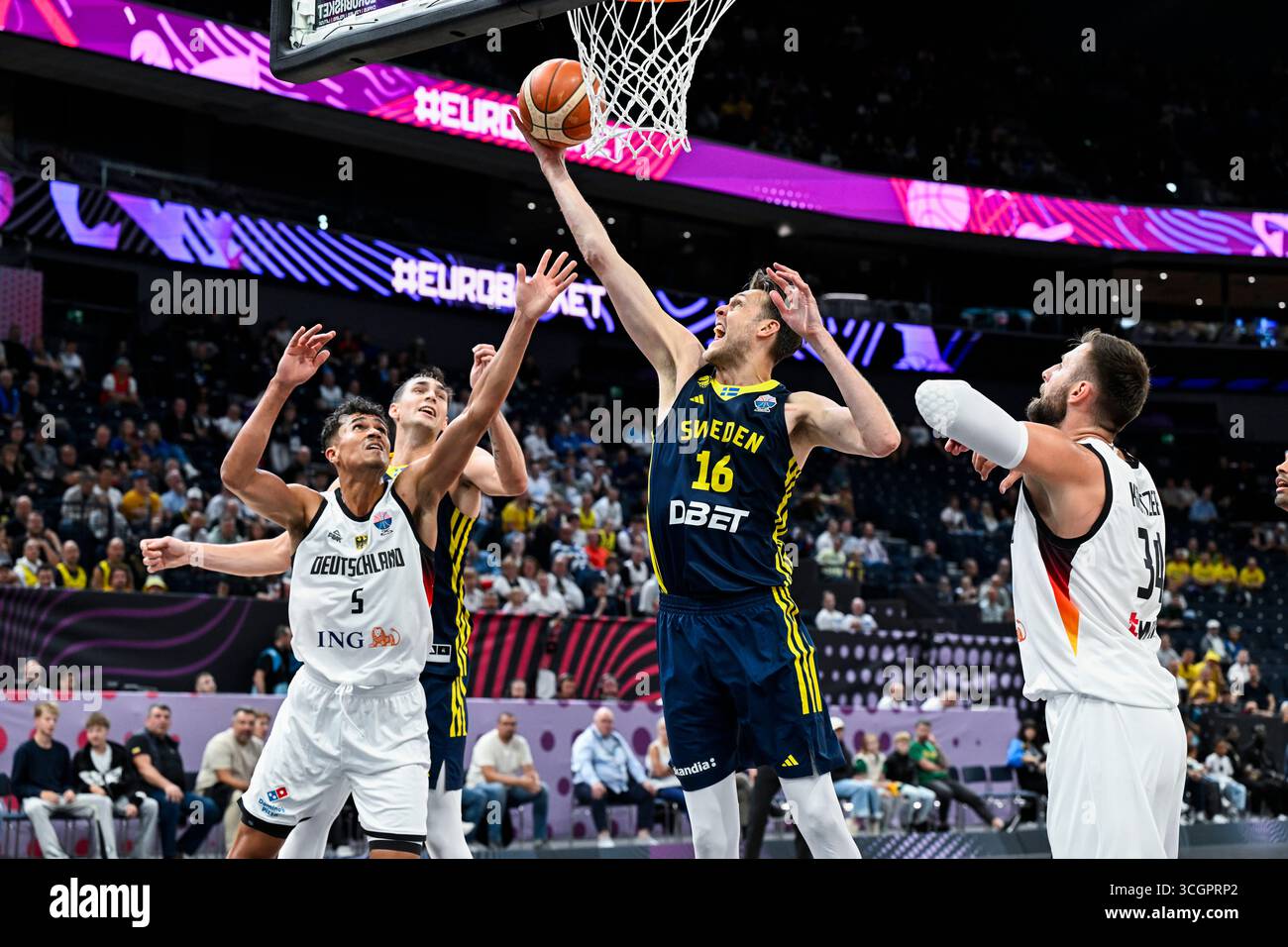 Sweden's Nicholas Spires against Germany's Tristan DaSilva and Leon ...