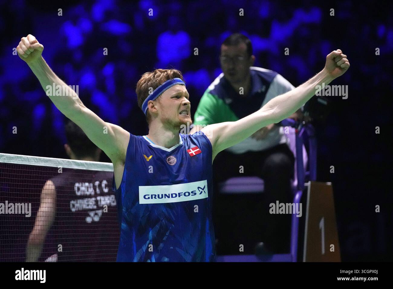 Anders Antonsen, of Denmark, celebrates after winning his Men's Singles ...