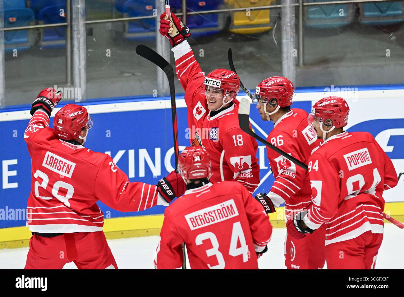 Georgs Golovkovs (Odense; middle) celebrates a goal with team mates ...