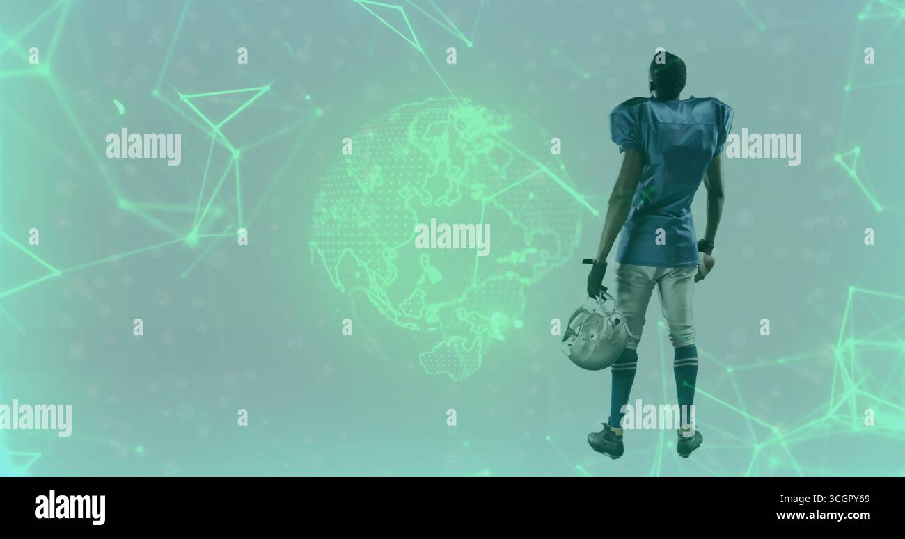 Holding helmet, football player in uniform viewing holographic globe in ...