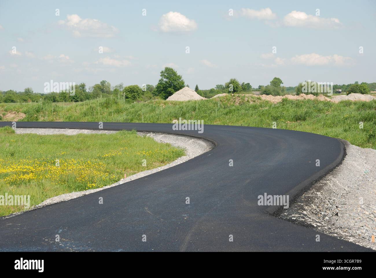 Highway A4 construction – heavy machinery and asphalt base Stock Photo ...