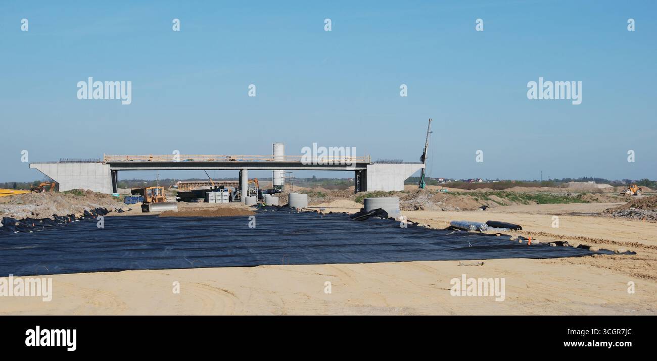 Highway A4 construction – heavy machinery and asphalt base Stock Photo ...