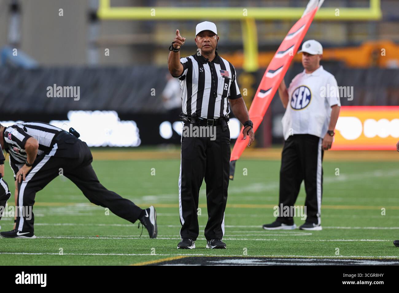 COLUMBIA, MO - AUGUST 28: Referee James Carter signals first down during a college football game ...