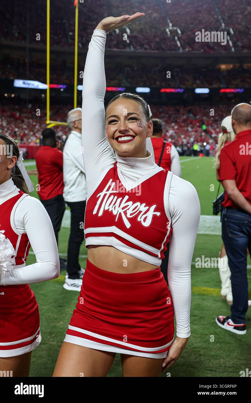 August 28, 2025: A Nebraska Cornhuskers cheerleader waves to the crowd during an NCAA football ...