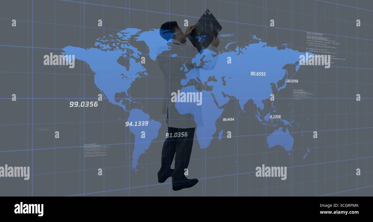 Business man analyzing world map with numeric overlays in data room ...