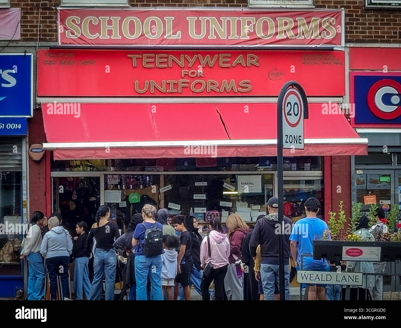 London, UK. 29th August 2025. Back to school. Locals in Harrow queue ...