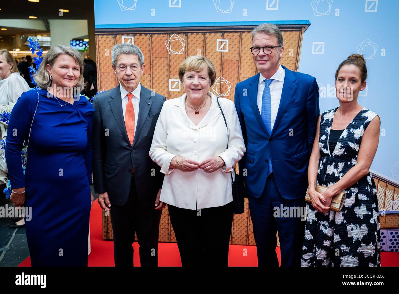 29 August 2025, Berlin: Angela Merkel (CDU, center), former German ...
