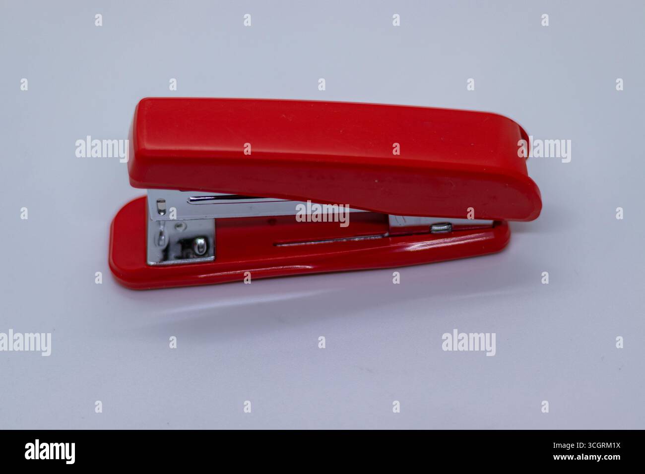Mini stapler for paper binding isolated product Stock Photo - Alamy