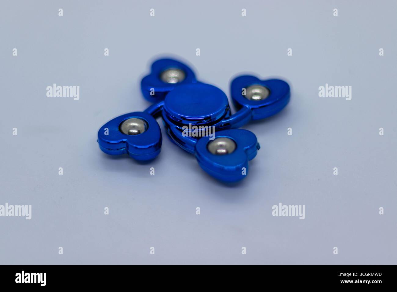 Premium Blue Alloy Fidget Spinner with Multiple Bearings on Minimal ...