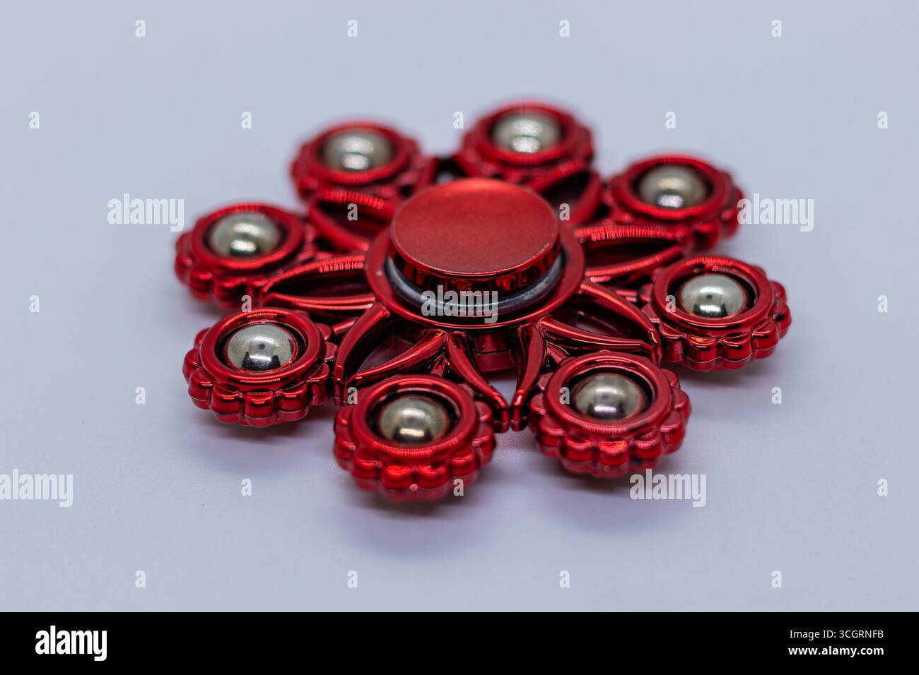 Shiny red metal fidget hi-res stock photography and images - Alamy