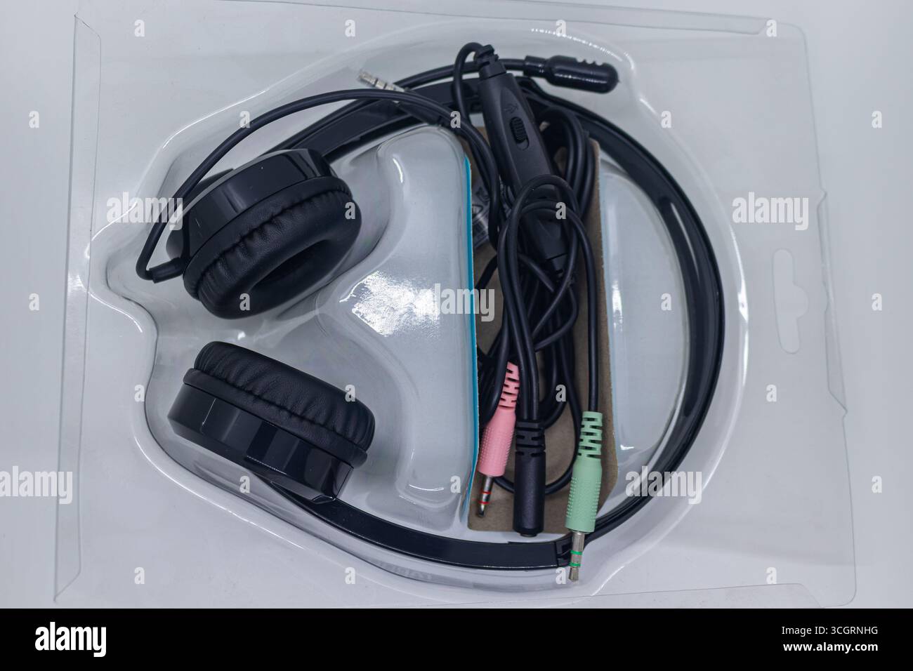 Side view of classic wired headset on white backdrop Stock Photo - Alamy