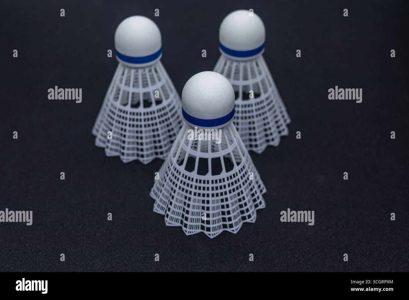 White Badminton Feather in Focus Stock Photo - Alamy