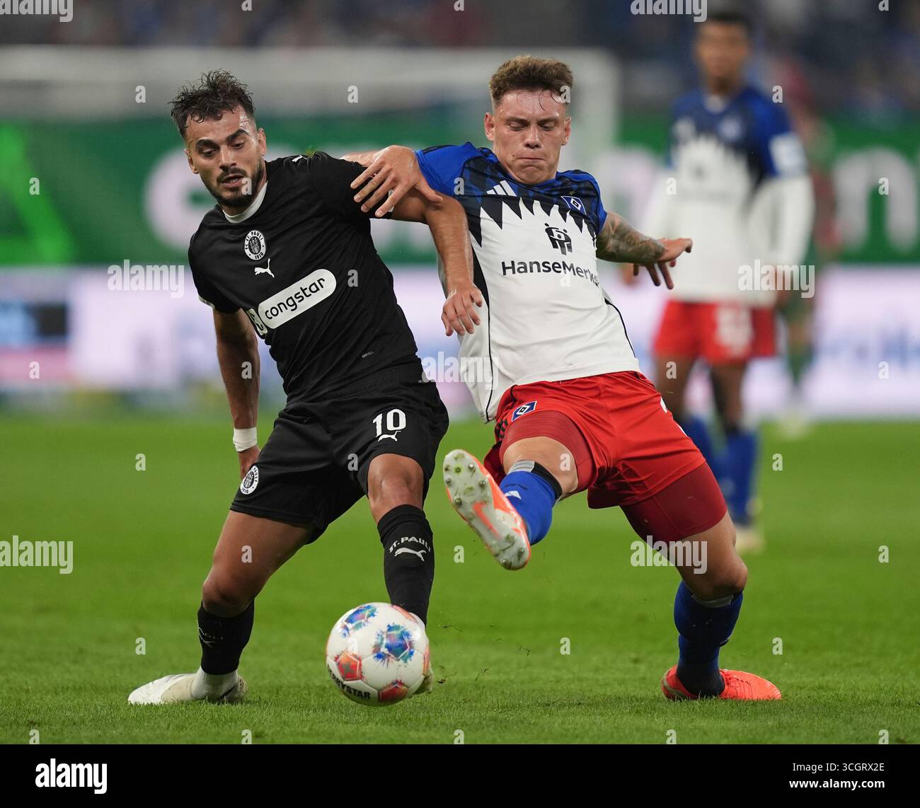 FC St. Pauli's Danel Sinani, left, and Hamburger SV's Nicolai Remberg ...