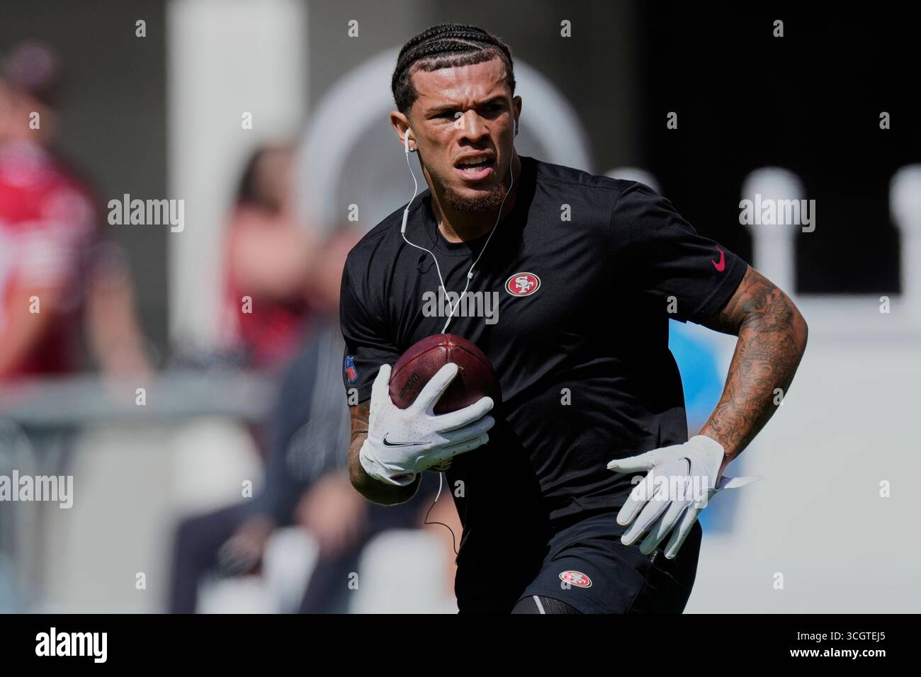 San Francisco 49ers wide receiver Skyy Moore warms up before an NFL preseason football game ...